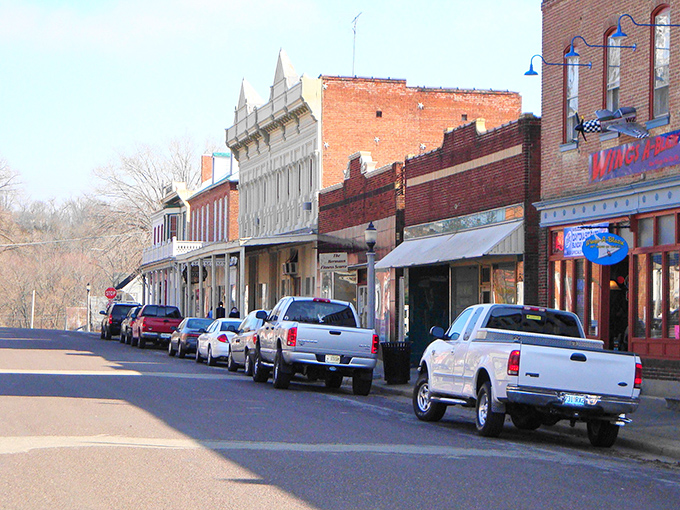 Historic brick buildings line Hermann's main street, where German heritage meets Midwest charm in a postcard-perfect small town setting.