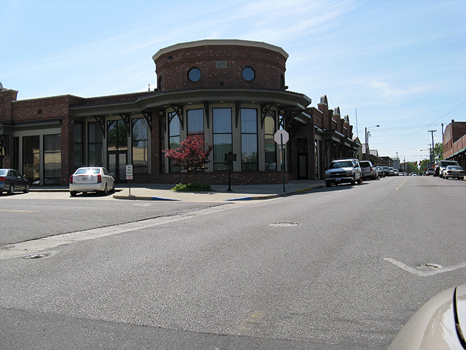 Architectural charm meets small-town practicality at this distinctive corner building in downtown Cullman, where history and modern life blend seamlessly.