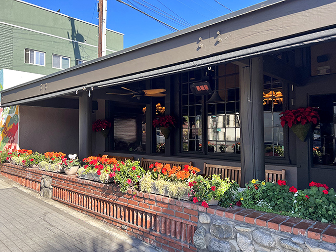 The Kettle's flower-adorned exterior isn't just pretty&mdash;it's a promise. Those vibrant blooms welcome you like a colorful handshake before the main event begins.