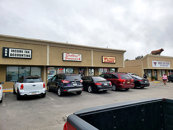 Welcome to flavor town! Sweet's Diner's retro sign promises a trip down memory lane, with a side of crispy bacon.