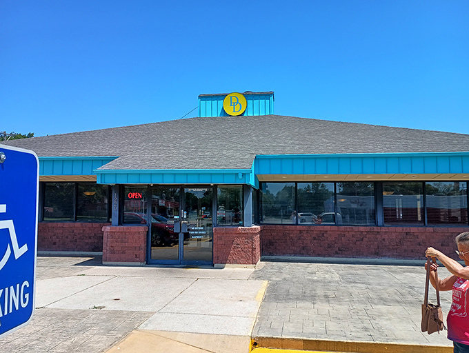 A blue beacon of breakfast bliss! Delano's Diner stands ready to satisfy your morning cravings, like a lighthouse guiding hungry sailors to shore.