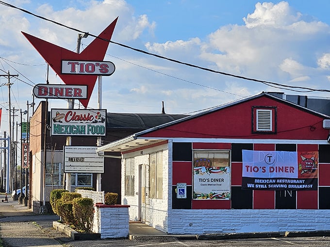 The red and white checkered exterior of Tio's Diner stands as a time capsule of Americana, beckoning hungry travelers with nostalgic charm.