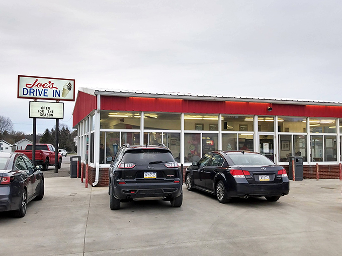 Joe's Drive In stands proudly against the Pennsylvania sky, its classic red and white exterior beckoning hungry travelers like a beacon of comfort food hope
