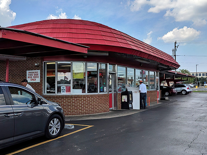 The iconic red-roofed Doumar's stands like a time capsule on the Norfolk corner, its curved architecture a beacon for hungry travelers seeking authentic Americana.