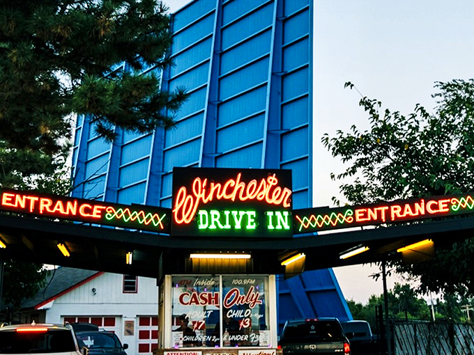 Sunset magic at the Winchester Drive-In, where vintage trucks and modern sedans share the same timeless experience under Oklahoma's painted sky.