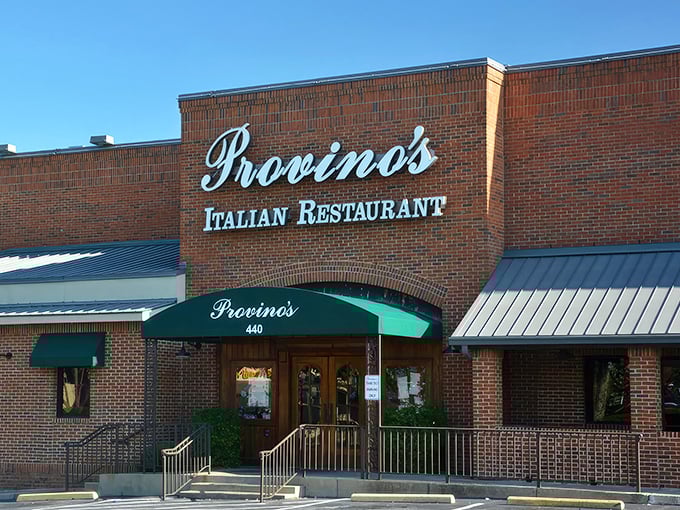 The iconic brick fa&ccedil;ade and emerald awning of Provino's stands as a beacon of hope for the pasta-deprived masses of Kennesaw.