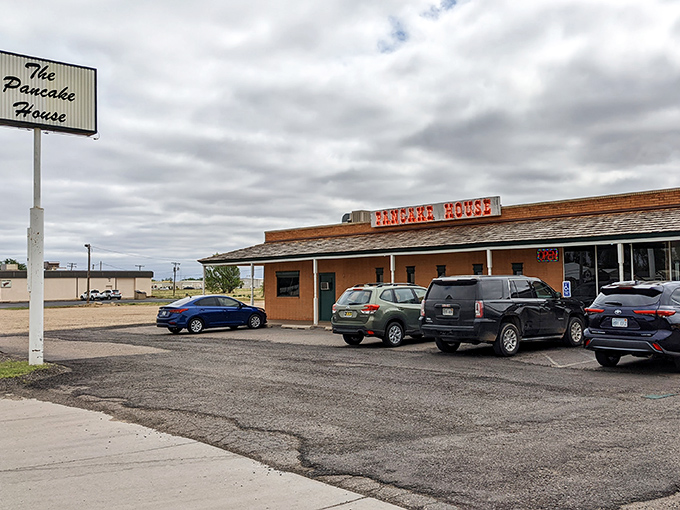 The unassuming exterior of The Pancake House in Liberal might not scream "culinary destination," but that parking lot full of locals tells the real story.
