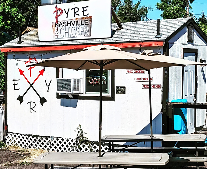 The unassuming white shack with its bold red logo promises a flavor explosion that belies its humble exterior. Southern heat meets Pacific Northwest charm.