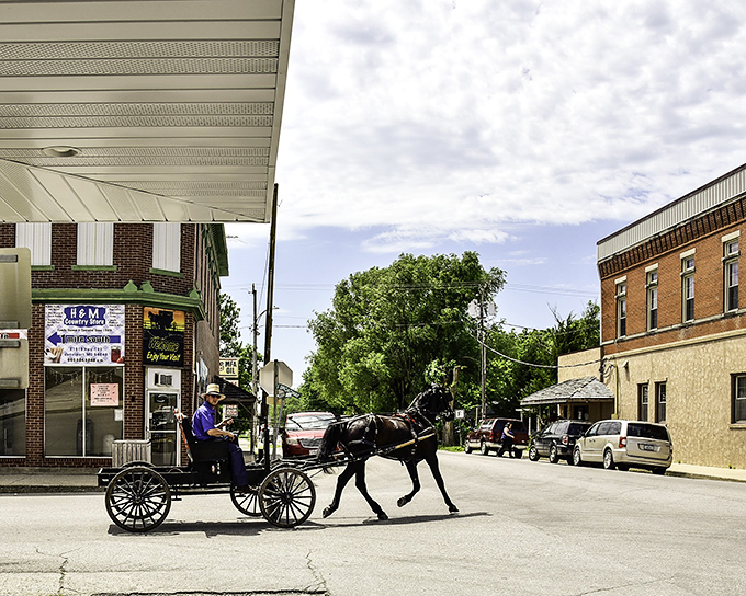 Where worlds collide &ndash; an Amish buggy sharing the road with modern vehicles perfectly captures Jamesport's unique blend of past and present. 