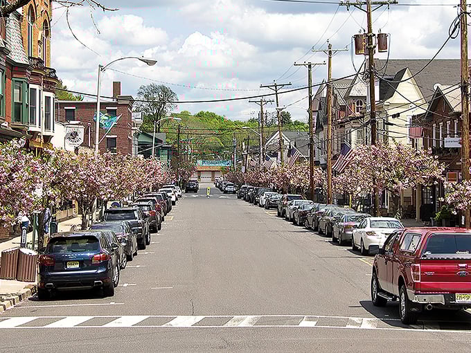 Cherry blossoms frame Main Street like nature's confetti, transforming Clinton into the kind of place where stress dissolves faster than aspirin.