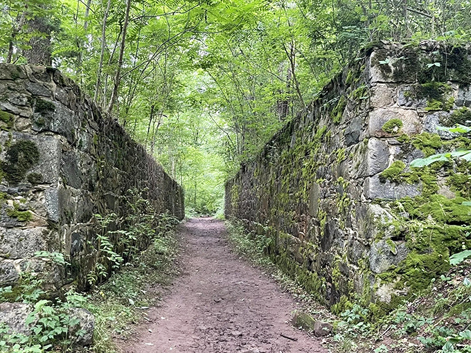 History flows between these ancient stone walls like whispers from the past&mdash;a perfect canal corridor for hikers and time travelers alike.
