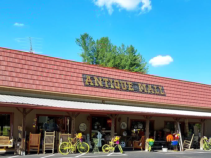 The red-roofed time capsule beckons with its colorful bicycle sentries standing guard. Like a portal to the past, Brown County Antique Mall promises treasures beyond that unassuming facade.