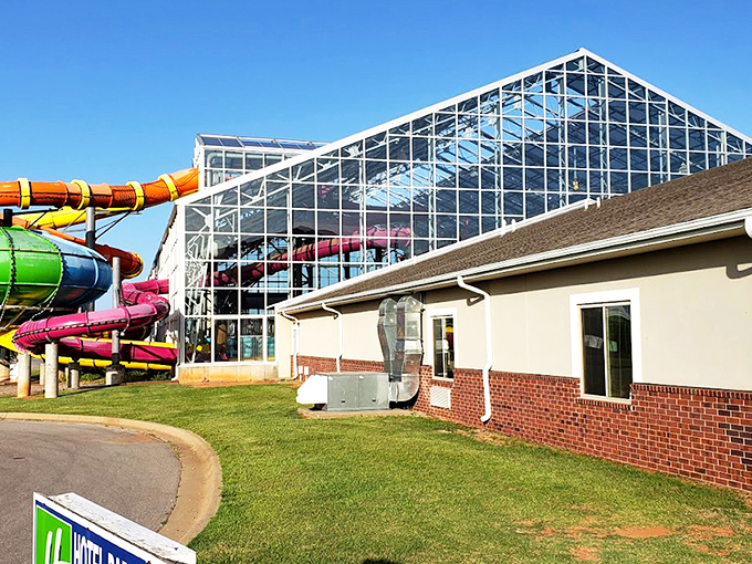 The architectural equivalent of a tropical vacation in Oklahoma. Those colorful tubes aren't just for show &ndash; they're portals to pure, climate-controlled joy regardless of what Mother Nature's brewing outside.