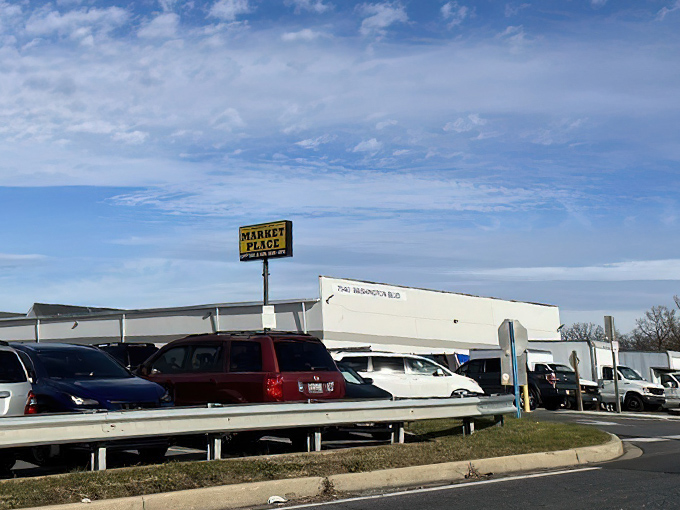 The indoor treasure hunt begins! Crowds navigate this labyrinth of bargains where one person's castoffs become another's prized possessions.