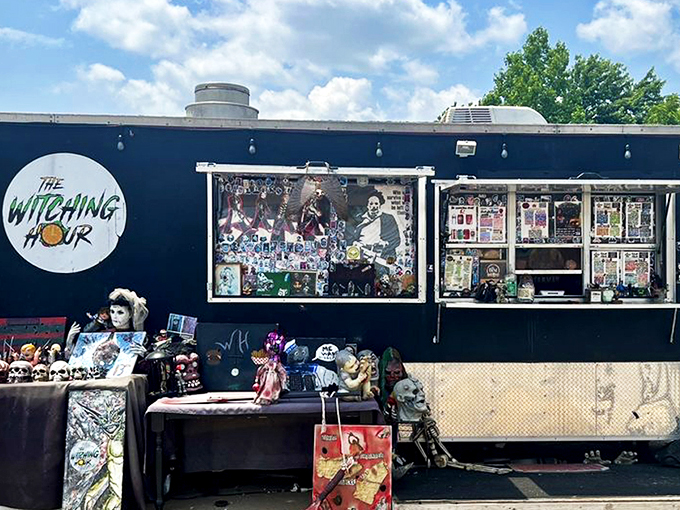 This isn't your average food truck &ndash; it's a haunted mansion on wheels, beckoning hungry souls with its matte black exterior and pink neon logo.