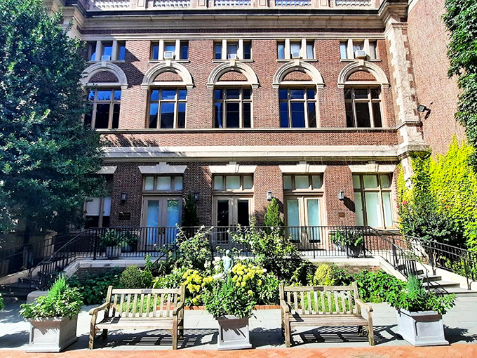 The iconic blue sign welcomes curious minds to Philadelphia's temple of medical marvels, standing bright against the city skyline like a beacon for the wonderfully weird.