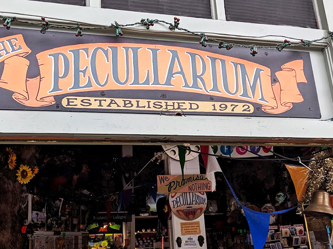 The pink fa&ccedil;ade of the Peculiarium beckons curious passersby with its vintage signage and promises of weirdness within.