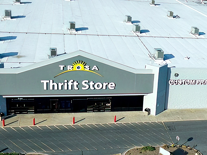 The cheerful sun logo beckons treasure hunters to this unassuming building housing an Aladdin's cave of secondhand wonders and life-changing opportunities.