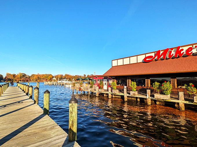 Waterfront dining doesn't get more literal than this—Mike's iconic red sign beckons hungry seafood lovers like a lighthouse for the famished.