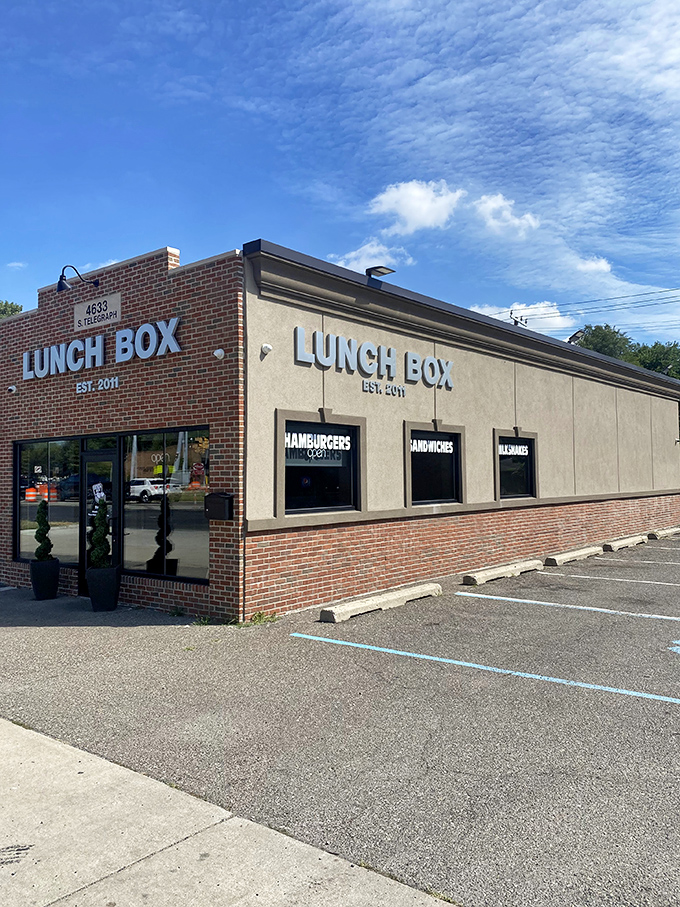 The brick facade of Lunch Box screams "unassuming gem." Those modest benches outside have witnessed countless post-sandwich food comas since 2011.