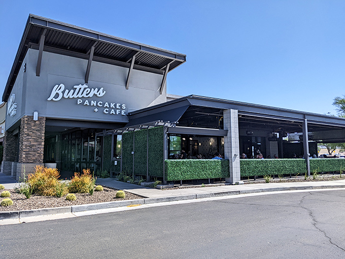 The stone-accented facade of Butters Pancakes & Cafe doesn't just welcome you&mdash;it practically issues a breakfast challenge to the line of eager patrons.