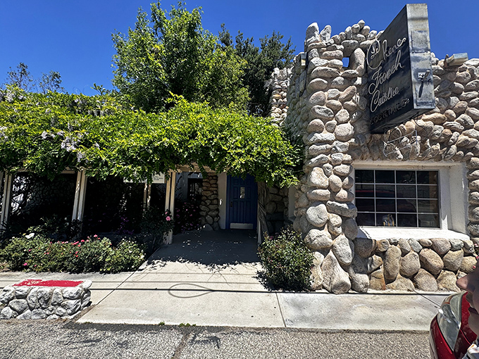 Stone by stone, this fairy tale fa&ccedil;ade promises culinary magic within. The blue door isn't just an entrance&mdash;it's a portal to France itself.