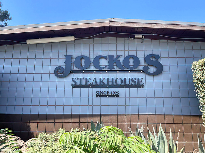 The unassuming exterior of Jocko's belies the culinary magic within. Like finding a treasure chest disguised as a shoebox, this modest fa&ccedil;ade hides California's steak paradise.