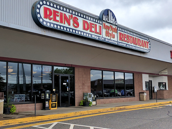 A neon beacon of deliciousness! Rein's Deli's sign promises New York-style eats that'll transport your taste buds faster than a subway ride to Manhattan.