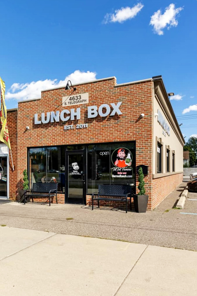 The brick facade of Lunch Box screams "unassuming gem." Those modest benches outside have witnessed countless post-sandwich food comas since 2011. 