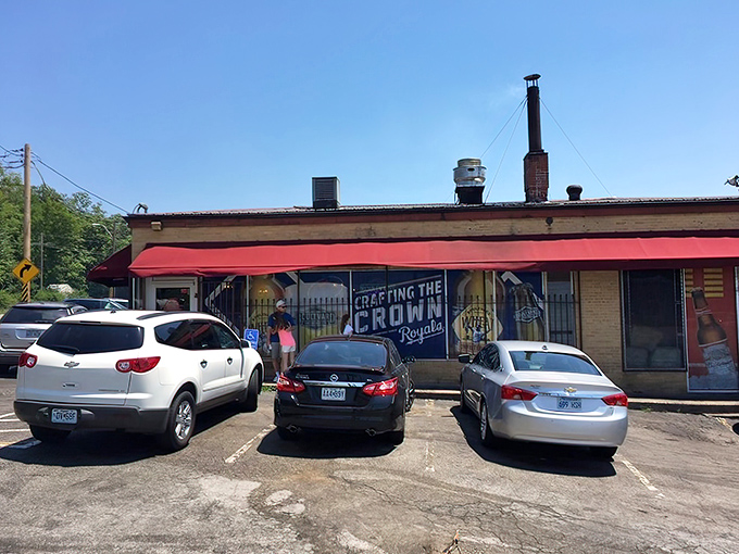 The unassuming exterior with its bright red awning houses barbecue magic that's drawn pilgrims from across Missouri for decades.