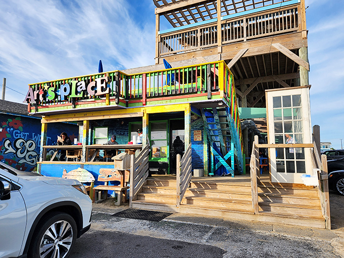 Welcome to Art's Place, where the exterior is as colorful as the characters inside. This beachside shack screams "fun" louder than a seagull eyeing your fries.