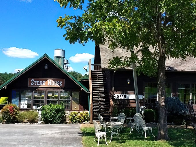 The rustic log cabin exterior of Trailhead Steak & Trout House promises what every great Tennessee meal should: honest food with no pretense, just pure deliciousness.