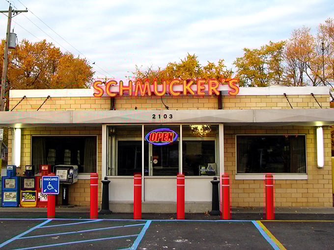 The glowing red sign of Schmucker's beckons like a lighthouse for hungry souls. Time-tested simplicity that promises exactly what it delivers.
