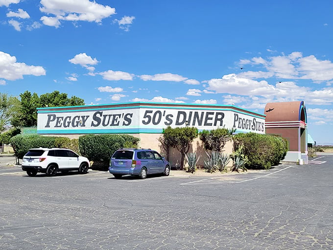 The rainbow-colored archway of Peggy Sue's beckons like a time portal in the desert. This isn't just a pit stop&mdash;it's a destination. 
