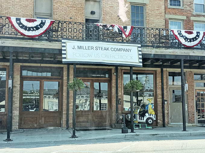 Historic charm meets culinary excellence at J. Miller Steak Company's striking brick exterior. Those patriotic buntings aren't just for show&mdash;they're signaling a revolution in flavor inside.