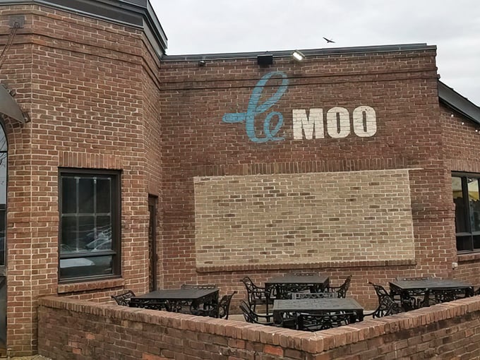 The brick fa&ccedil;ade of Le Moo welcomes hungry visitors like a carnivore's storybook cottage. Rustic charm meets upscale dining at Louisville's premier steakhouse destination.