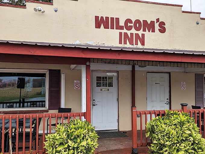 The unassuming exterior of Wilcom's Inn proves once again that the best culinary treasures often hide behind the simplest facades. Like finding a Rolex in a paper bag.
