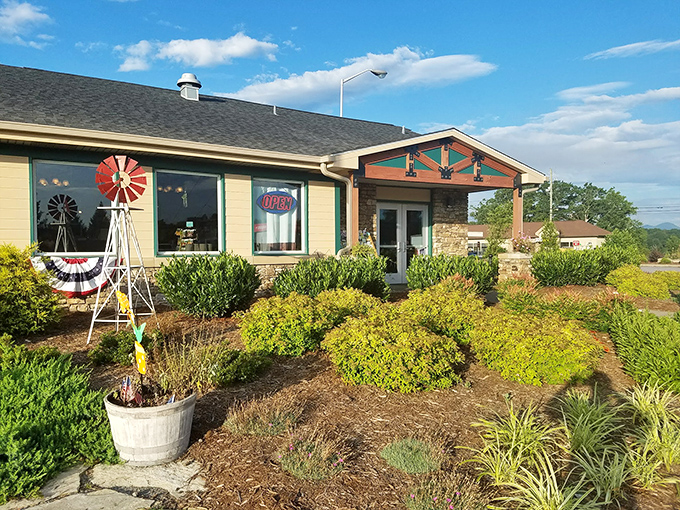 The welcoming fa&ccedil;ade of Moose Cafe in Asheville, where the landscaping is as thoughtfully prepared as the comfort food waiting inside.