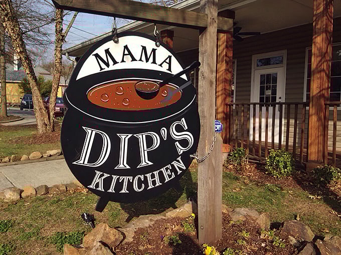 The iconic Mama Dip's sign welcomes you like an old friend, promising comfort food that'll make you forget all your troubles.