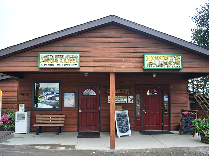 The unassuming wooden exterior of Denny's Beer Barrel Pub &ndash; where burger legends are born and diets go to die.