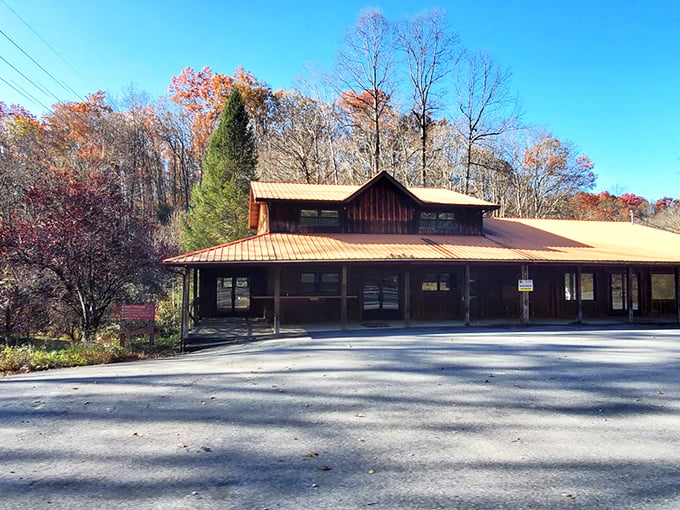 The unassuming exterior of Firecreek BBQ & Steaks might fool you, but that red-roofed wooden building houses flavor explosions that'll make your taste buds dance.
