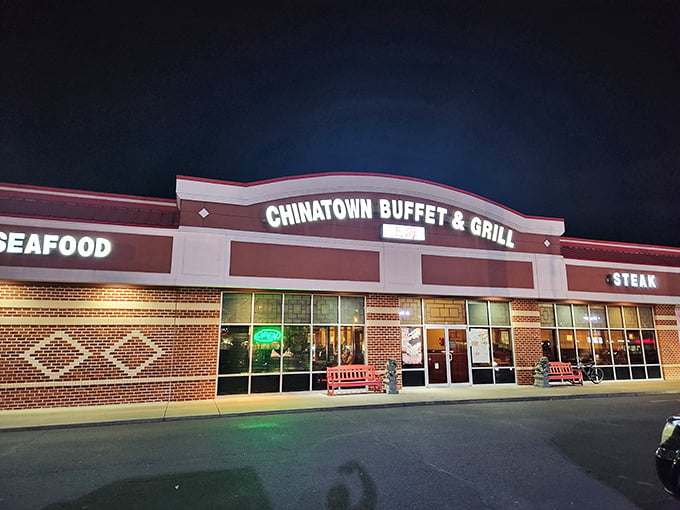 The iconic red-roofed exterior of Chinatown Buffet & Grill stands like a beacon of culinary promise in Rehoboth Beach, boldly announcing "SEAFOOD" to hungry passersby. 