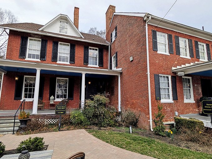 History wrapped in brick and mortar! The Elkridge Furnace Inn's stately exterior whispers stories from the 1700s while promising modern culinary delights inside.