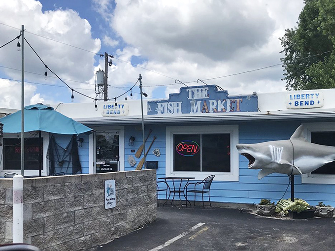The unassuming blue exterior of The Fish Market in Liberty might fool you, but those string lights are basically saying "seafood paradise ahead!"