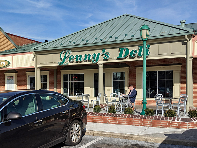 The teal script of Lenny's Deli against brick and cream siding isn't just signage&mdash;it's a promise of comfort food that transcends trends and satisfies souls.