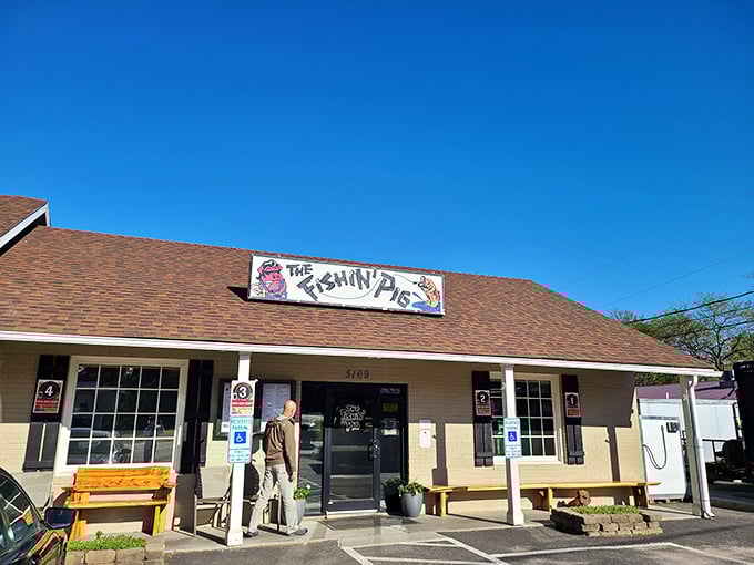 The unassuming exterior of The Fishin' Pig belies the culinary treasures within &ndash; like finding a Michelin star hiding in your favorite fishing hat.