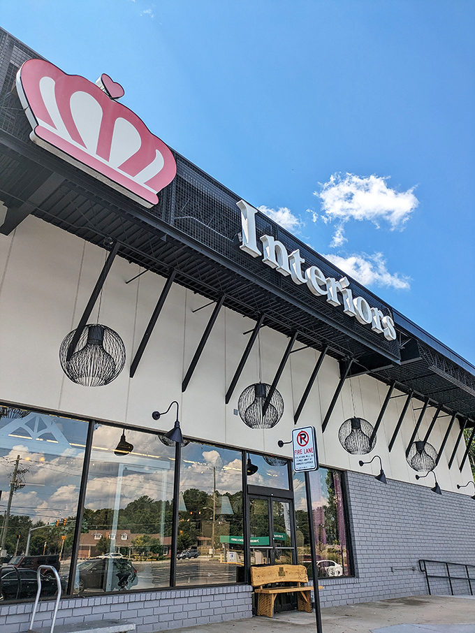 The royal welcome! Queen of Hearts Antiques & Interiors stands proudly in Marietta, its crown logo promising treasure hunters a kingdom of vintage delights inside.