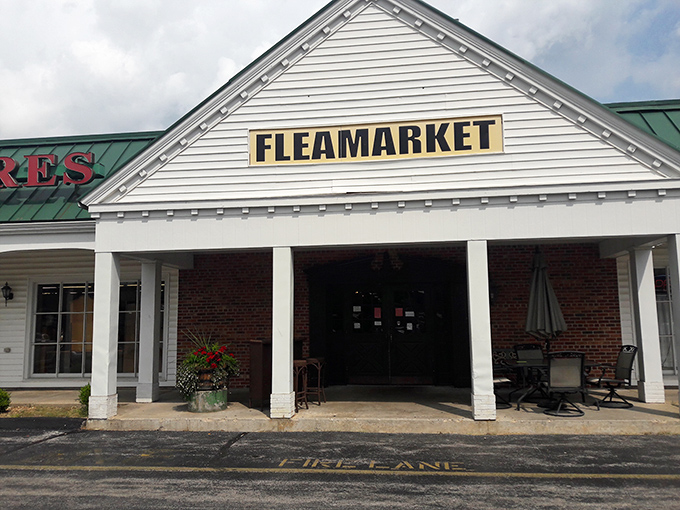 The stately exterior with its distinctive green roof announces "FLEAMARKET" like a siren song to treasure hunters everywhere.