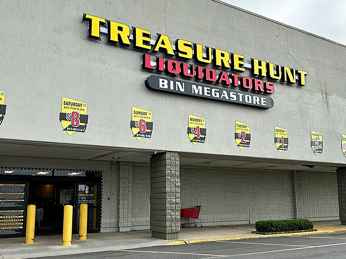 The bright yellow signage of Treasure Hunt Liquidators beckons bargain hunters like a retail lighthouse in Norfolk's commercial landscape.