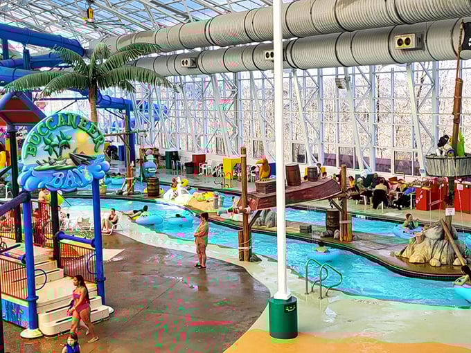 The indoor tropical paradise where winter goes to die. Colorful water structures and artificial palm trees create a mirage of summer under a cathedral of glass.